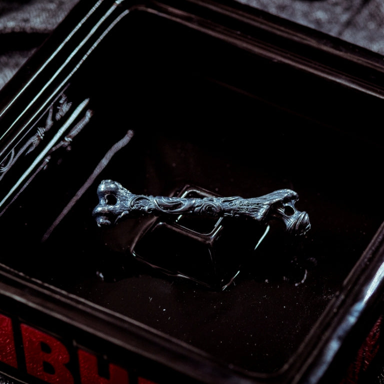 Carved Silver Thighbone – Coppertist